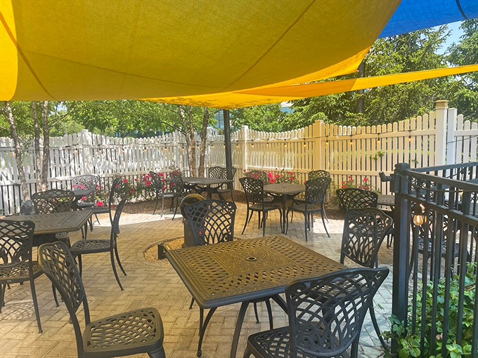 The outdoor patio offers a sun-dappled escape where pancakes taste even better with a side of fresh air.