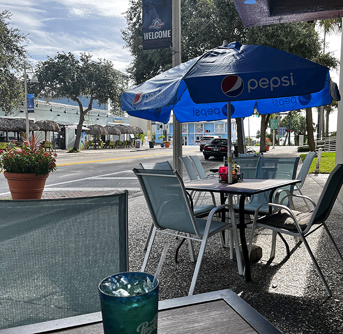 Outdoor seating under Florida skies—where your coffee tastes better and your people-watching skills get a proper workout.