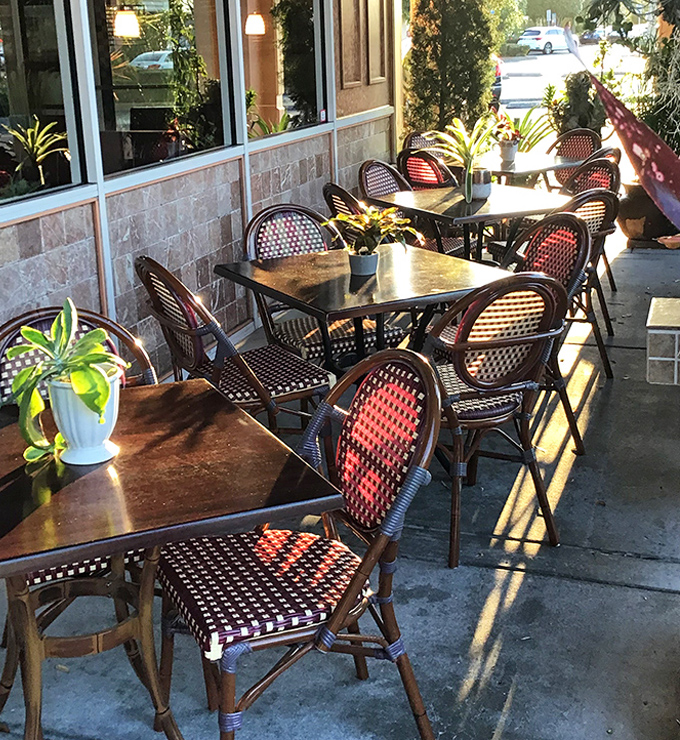 Florida dining done right&mdash;outdoor seating with bistro charm. Those woven chairs have "linger over coffee" written all over them.