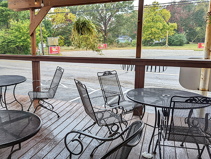 The patio where summer evenings stretch into night. Simple metal furniture that's seen countless conversations and first dates.
