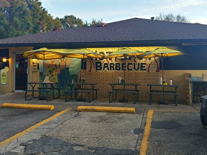 The outdoor patio says, "Florida sunshine and barbecue belong together" with all the subtlety of those bright yellow umbrellas.
