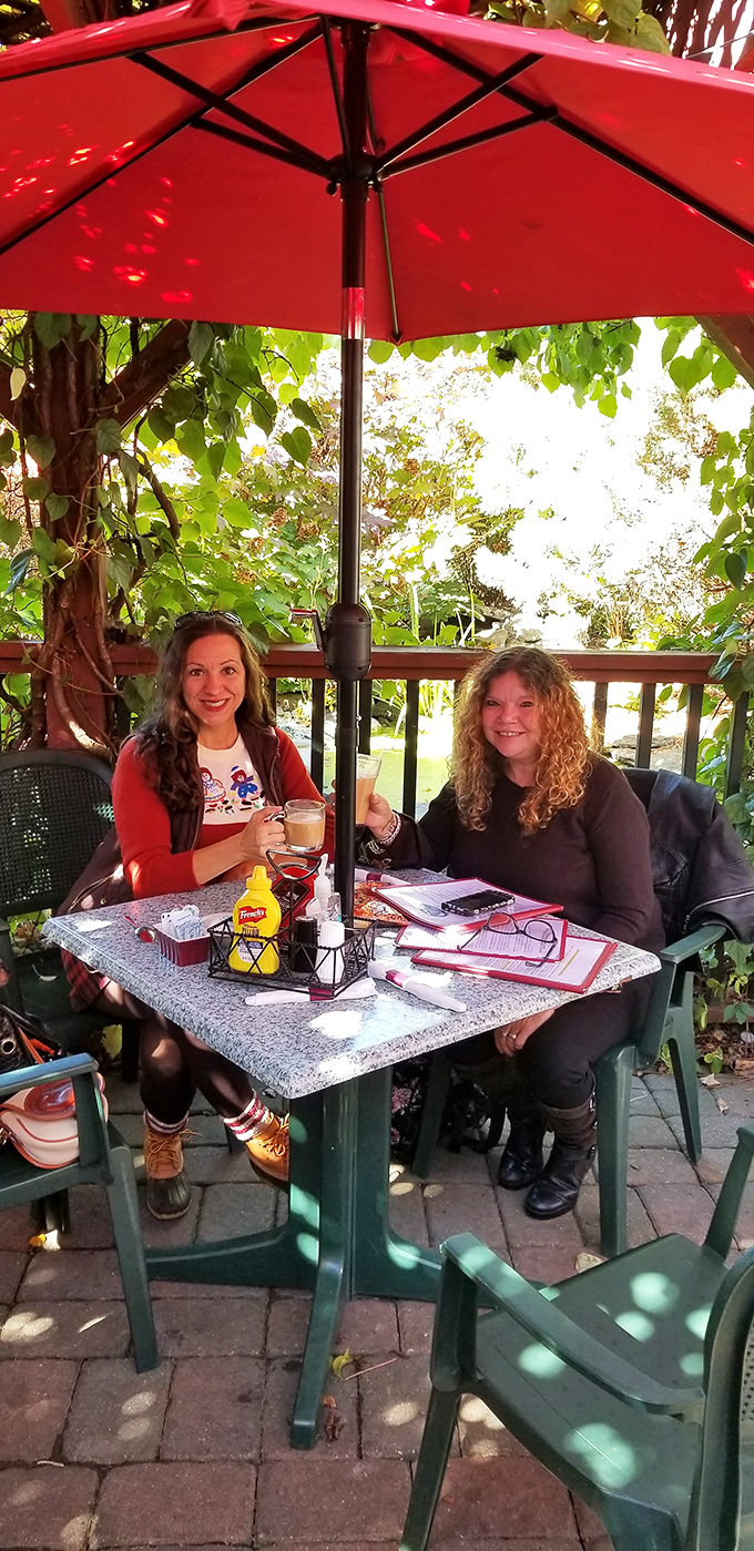Outdoor dining under dappled sunlight&mdash;nature's Instagram filter. The perfect setting for pretending you're eating healthier because you're outside.
