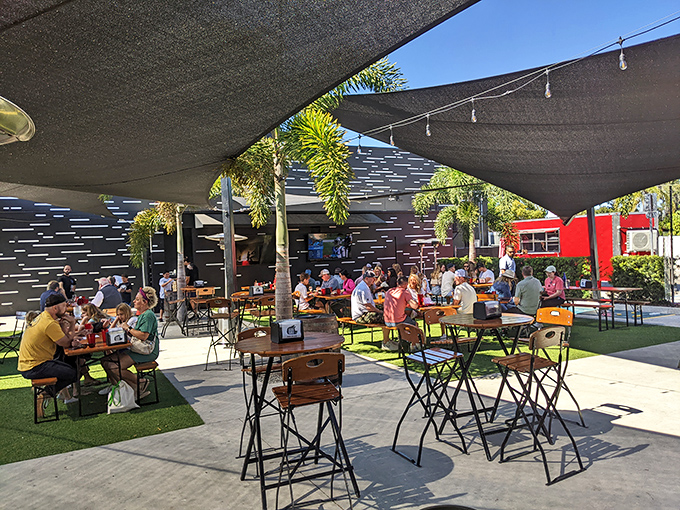 Florida outdoor dining done right&mdash;shaded, breezy, and surrounded by palms. Proof that paradise doesn't require a beach view.