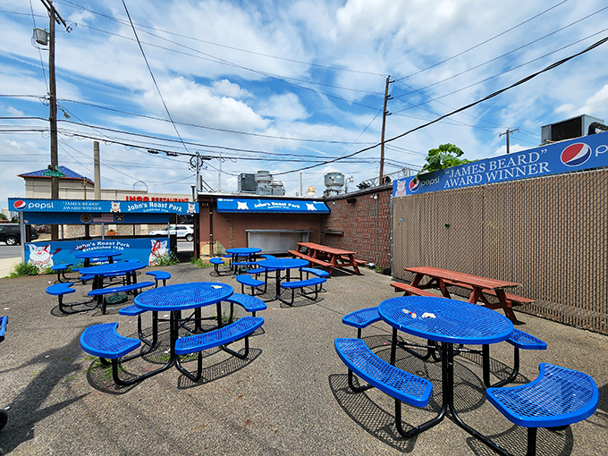 Outdoor seating that's as unpretentious as the food. Blue tables under the Philly sky&mdash;the perfect stage for sandwich appreciation.