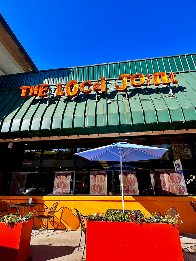Outdoor seating bathed in Carolina sunshine, where every table feels like the best seat in the house.