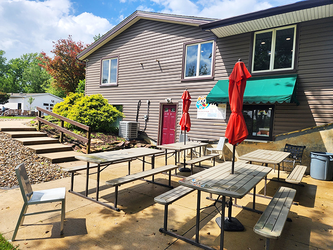 Outdoor tables bathed in Ohio sunshine offer the perfect stage for summer dining. Even the umbrellas match the Cleveland Browns' color scheme &ndash; no detail overlooked.