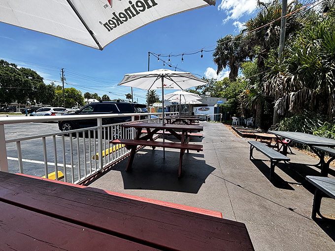 Umbrellas, picnic tables, and Florida sunshine create the perfect backdrop for the serious business of enjoying seriously good food. 