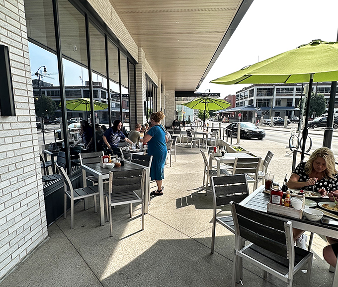 Outdoor seating under lime-green umbrellas&mdash;where pancake enthusiasts soak up vitamin D while debating the merits of maple versus blueberry syrup.