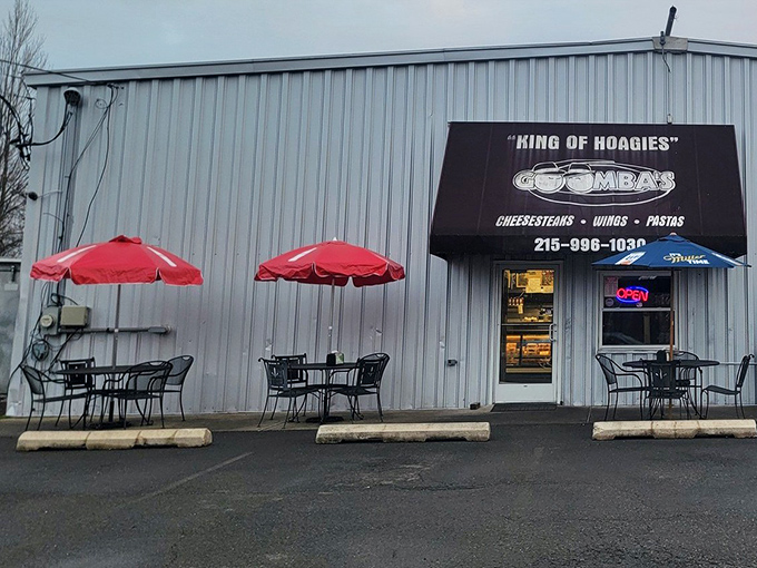 Those red umbrellas aren't just for show – they're beacons calling hungry travelers to pull over and experience cheesesteak nirvana.