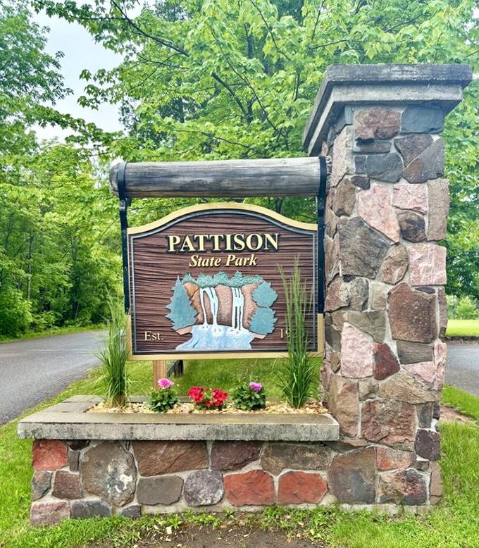 The entrance sign promises waterfalls and delivers. Those stone pillars have welcomed generations of nature lovers to this northern Wisconsin treasure.
