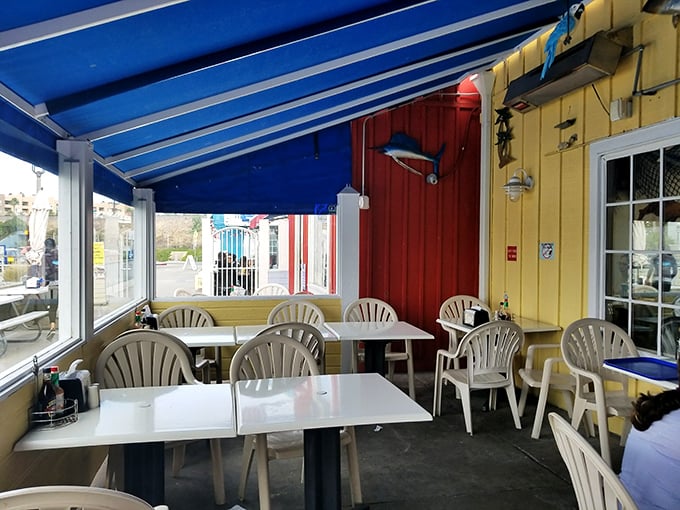 The covered patio offers al fresco dining with protection from the elements&mdash;because nothing should come between you and perfect fish.