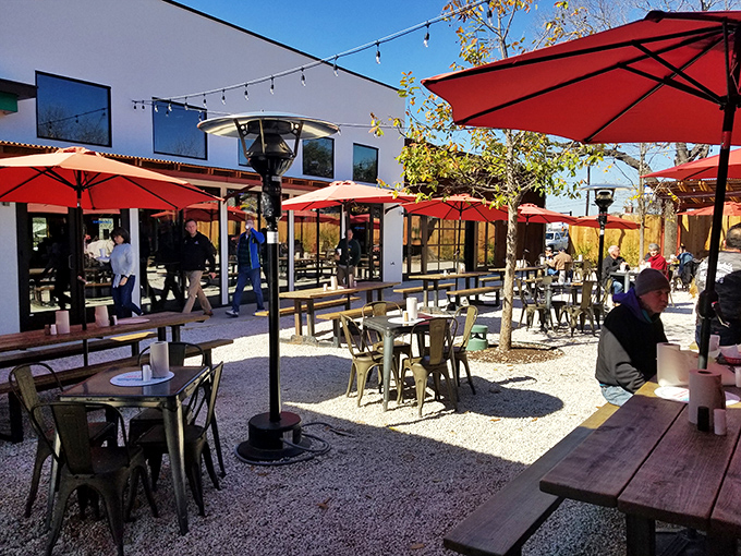 Al fresco dining under red umbrellas. Texas sunshine and burger perfection&mdash;some combinations are just meant to be.