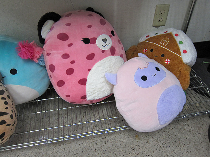 Stuffed companions waiting for their forever homes. That pink spotted friend has enough personality to become someone's favorite bedtime buddy.