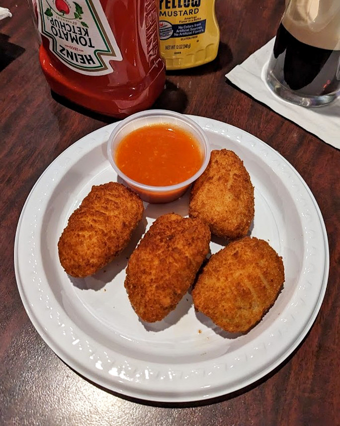 Crispy golden croquettes that deliver that satisfying crunch before revealing their savory interior&mdash;the culinary equivalent of a plot twist.