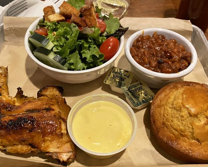 A quarter chicken that's clearly been on a spa retreat in a smoker. Those beans look like they've been simmering since breakfast.