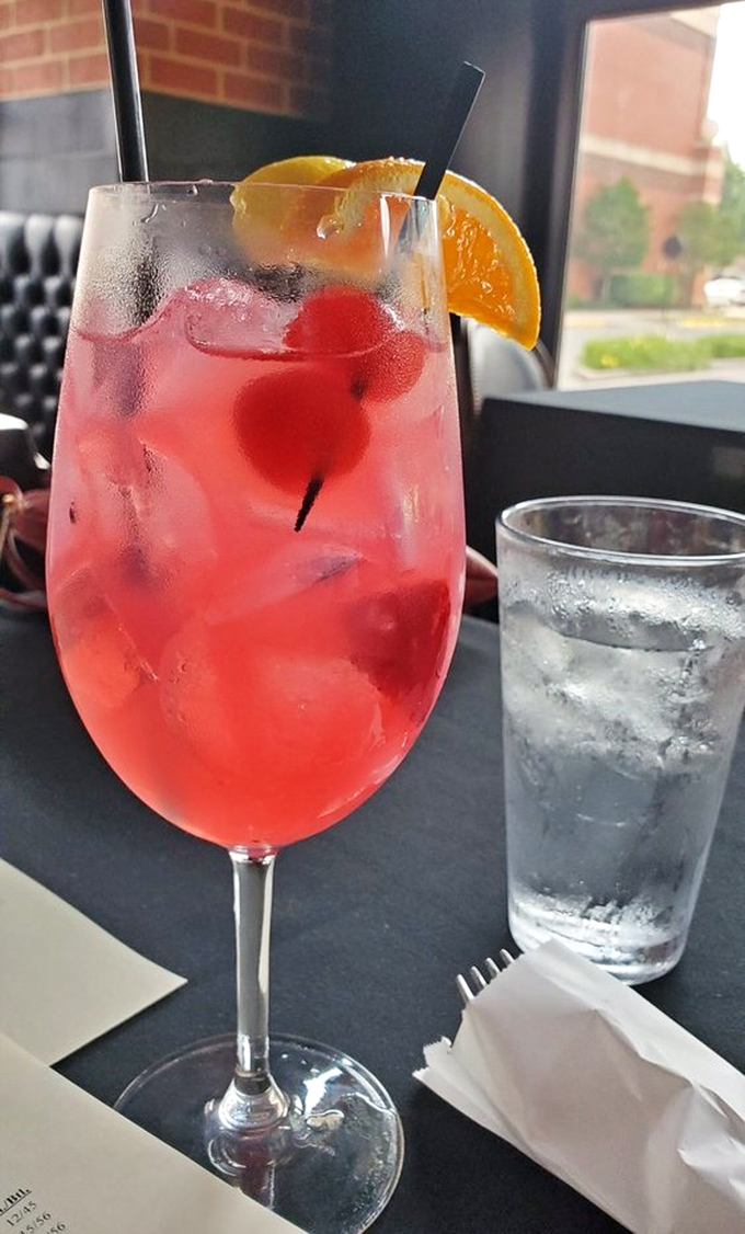 A sangria so photogenic it belongs on a magazine cover, with fruit that's actually enjoyed its swim in the wine.