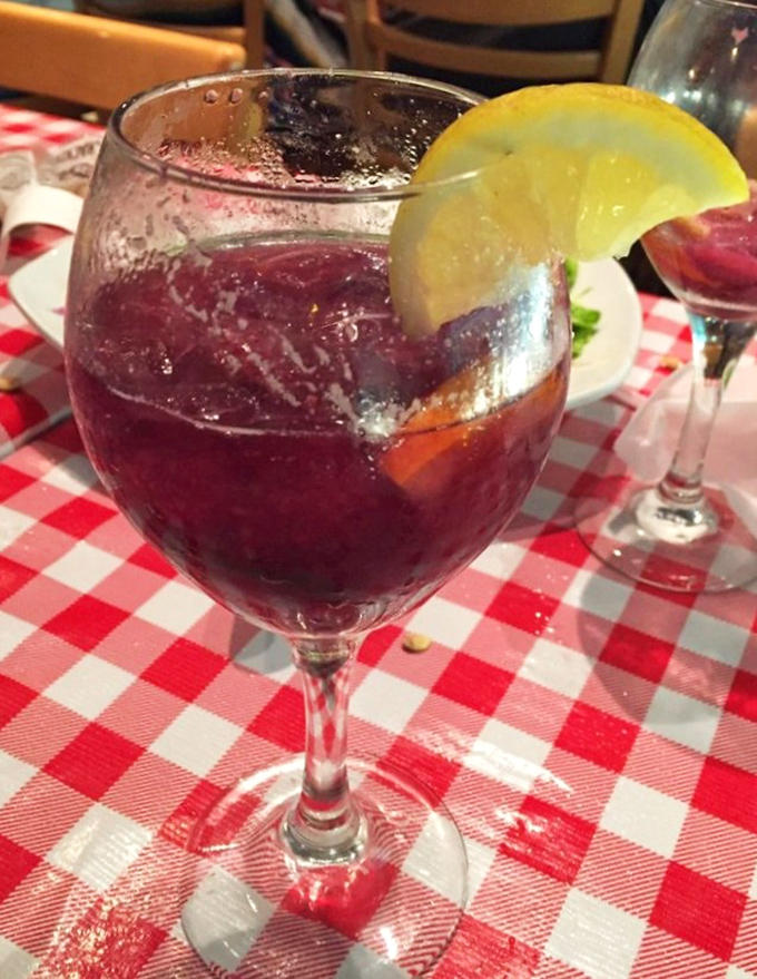 Sangria the color of sunset promises fruity refreshment between bites of seafood. The perfect vacation in a glass, no passport required.