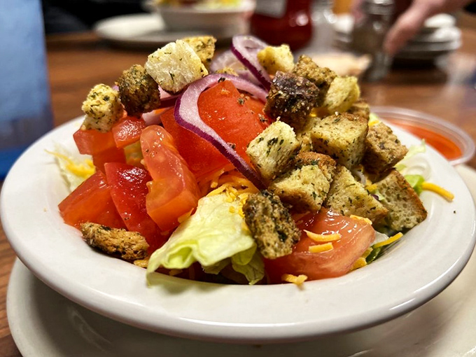 A salad that doesn't apologize for being a salad. Those homemade croutons aren't just garnish &ndash; they're the supporting cast.