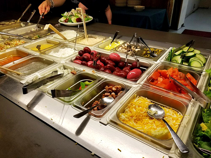 A salad bar that offers enough fresh ingredients to convince yourself you're eating healthy before diving into the dessert section.