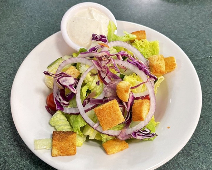 A salad that actually looks like it wants to be eaten, not just photographed for your health-conscious cousin's Instagram.