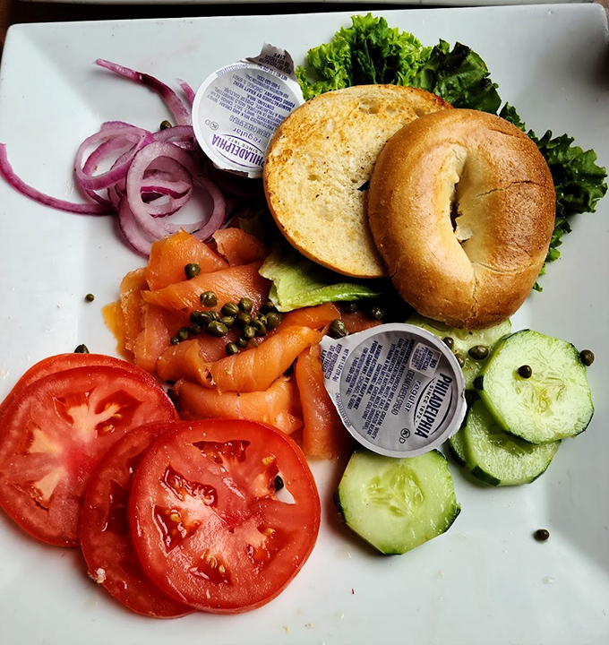 A bagel board that's basically a deconstructed work of art. Those tomato slices are practically stained glass windows in the cathedral of breakfast.