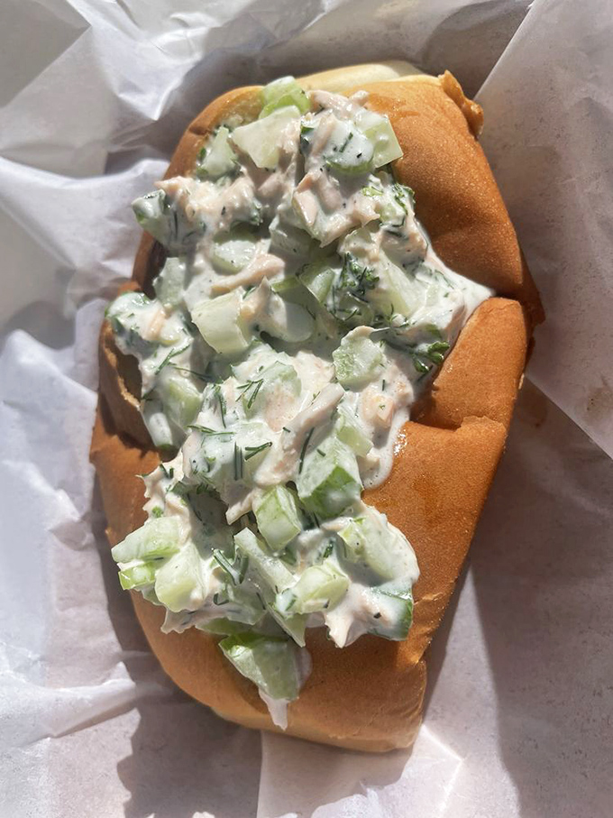 A salmon salad roll that brings together the best of land and sea. Fresh herbs and creamy dressing make magic happen.