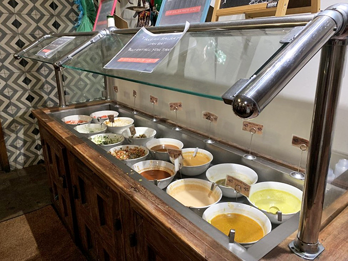 The salsa bar at La Santisima isn't just condiments—it's a flavor laboratory where your taco experiments begin. Choose your adventure wisely.
