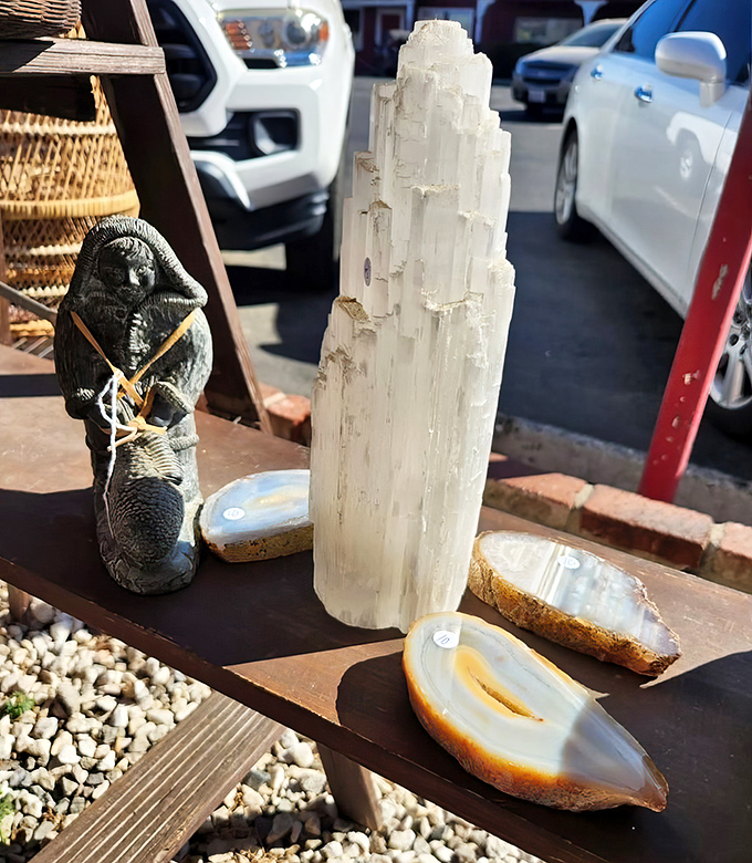 Selenite towers and stone sculptures create an outdoor gallery. Nature's artwork gets a second chance to shine in someone else's meditation space.