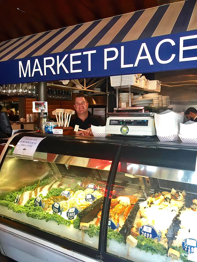 The Market Place seafood counter &ndash; where tomorrow's dinner waits on ice. Like a jewelry store, but the gems are edible and taste like the ocean.