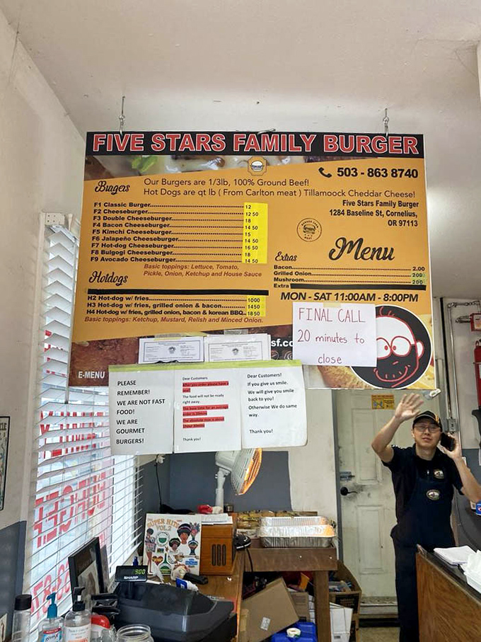 The overhead menu board proudly announces their commitment to quality ingredients, including Carlton meat and 1/3 pound burgers that mean business.