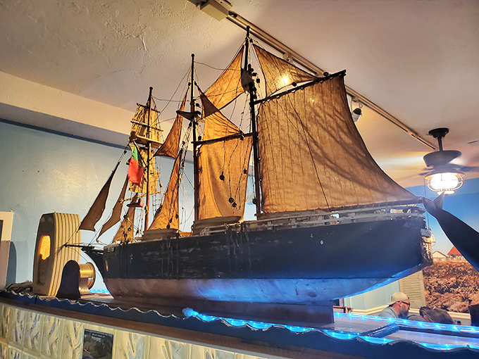 This model ship isn't just decoration&mdash;it's a reminder that the best seafood journeys don't require leaving dry land.