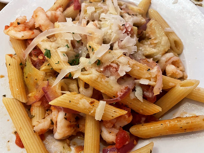 Pasta that doesn't just sit on the plate &ndash; it performs. Shrimp and artichokes stealing the spotlight in this Italian ensemble.