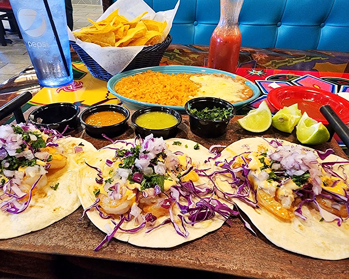 These shrimp tacos aren't merely assembled&mdash;they're composed, with purple cabbage adding dramatic contrast against tender shrimp and soft tortillas.