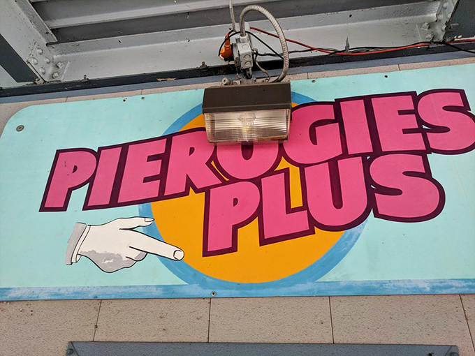 That pointing hand on the sign knows exactly what you need. Follow it to pierogi paradise without a moment's hesitation.