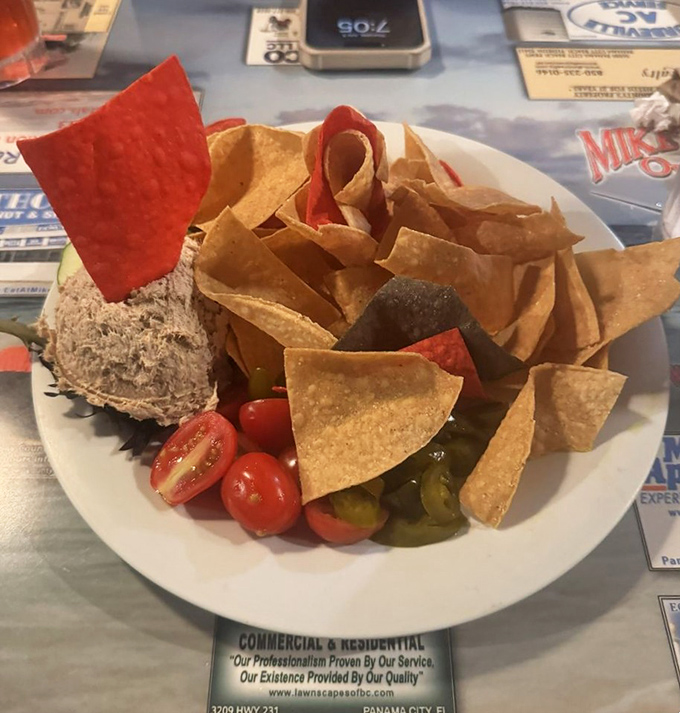 Smoked tuna dip surrounded by a colorful armada of chips and veggies—the appetizer equivalent of making a grand entrance.