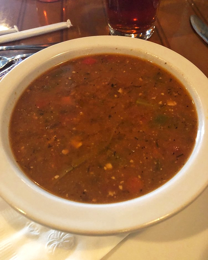 Traditional snapper soup warms both body and soul with time-honored flavors and genuine comfort.