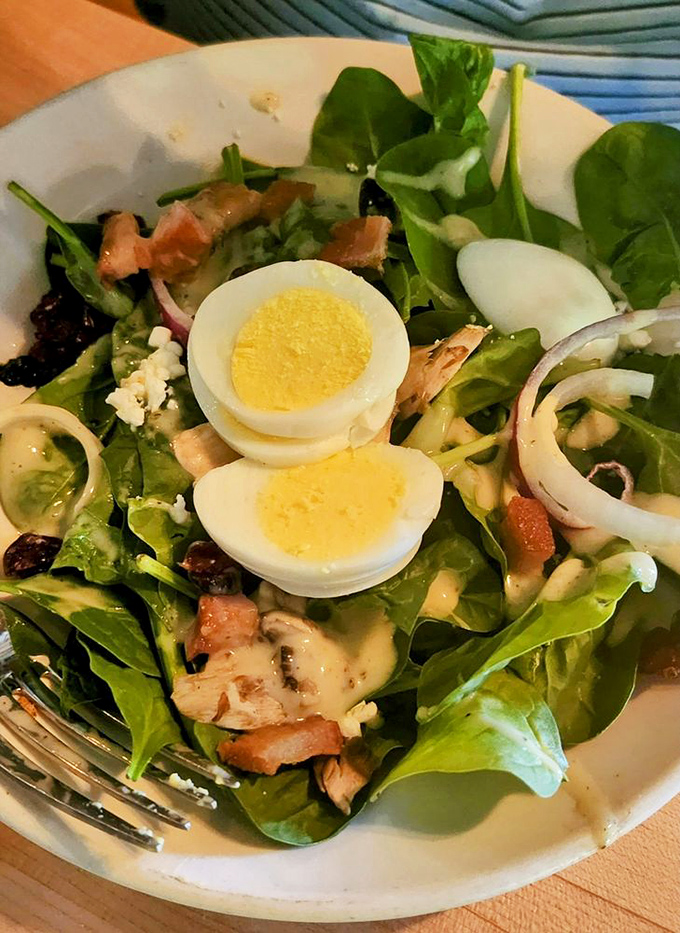 A spinach salad that could convert vegetable skeptics. When bacon, egg, and onion join forces, even leafy greens become irresistible.