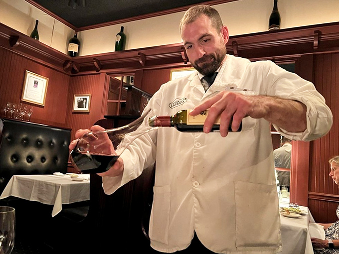 The sommelier's pour&mdash;that theatrical moment when the wine meets glass and anticipation builds for the feast to come. 