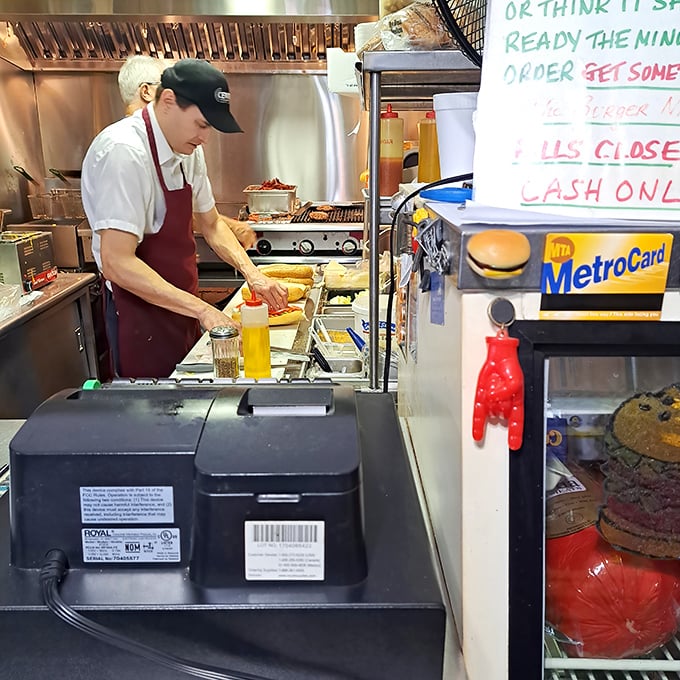 Sandwich artisans at work. These aren't just cooks&mdash;they're craftspeople creating edible masterpieces one order at a time.