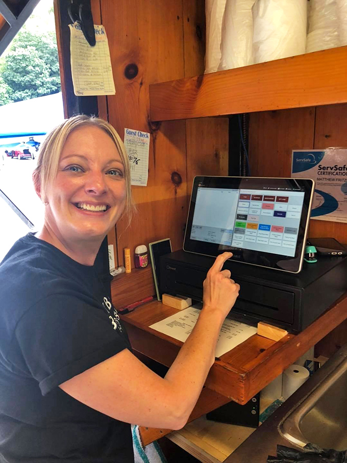 The smile says it all&mdash;when you're slinging barbecue this good, every order is a chance to make someone's day memorably delicious.