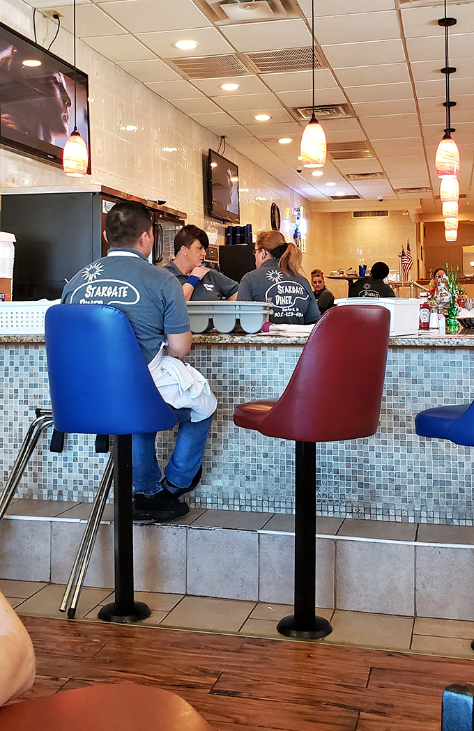 The staff's matching shirts aren't just uniforms—they're badges of honor in the breakfast battlefield.