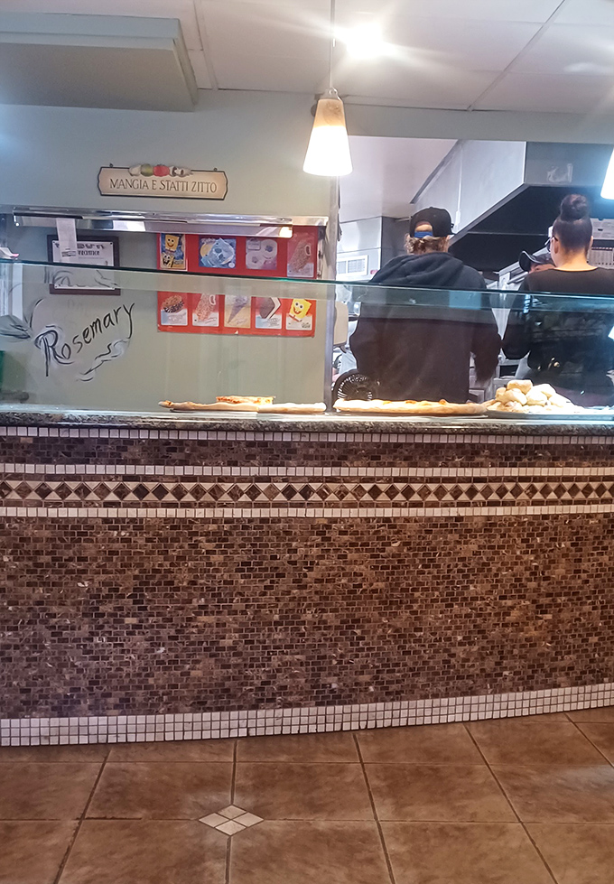 The friendly faces behind the magic, serving up smiles as generously as the portions.