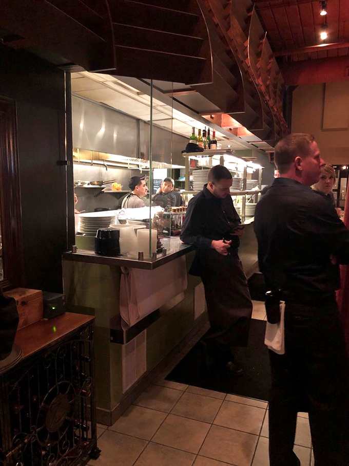 The hardworking kitchen team whose passion for authentic Italian cooking shows in every single dish.