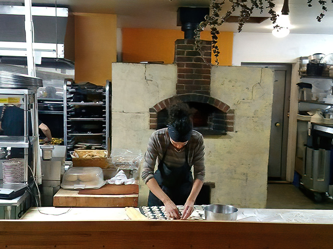 Hands that know exactly how much pressure to apply to dough. This isn't their first rodeo, and your taste buds will be the beneficiaries.