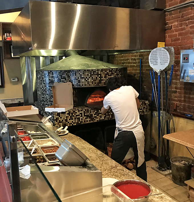Behind every perfect pizza is a dedicated artisan and a wood-fired oven that reaches temperatures hotter than Pittsburgh in August.