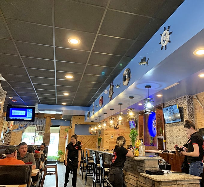 Where the magic happens – dedicated staff ensuring your seafood journey is smooth sailing from order to last bite.