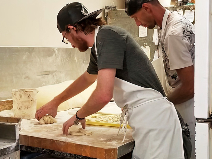Skilled hands shape tomorrow's happiness. These artisans don't just make donuts&mdash;they're creating memories that will linger long after the sugar rush fades.