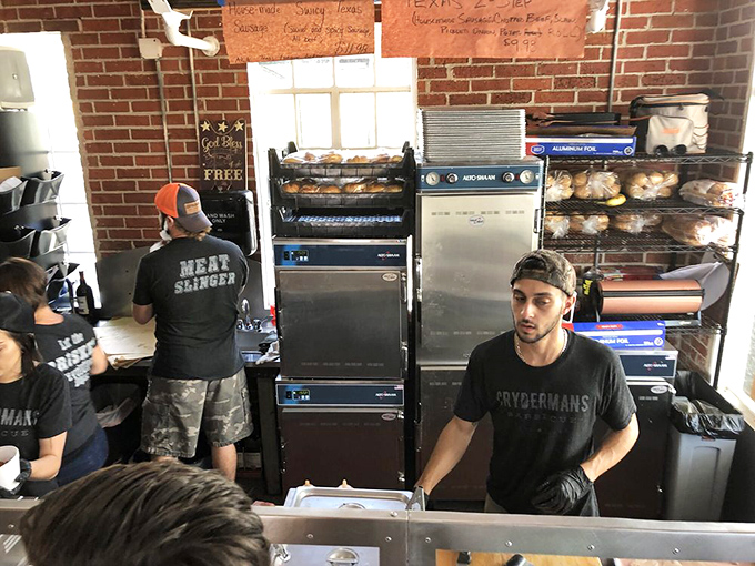 Behind every great barbecue is a team of smoke whisperers. That "MEAT SLINGER" shirt isn't just apparel, it's a job description and a calling.