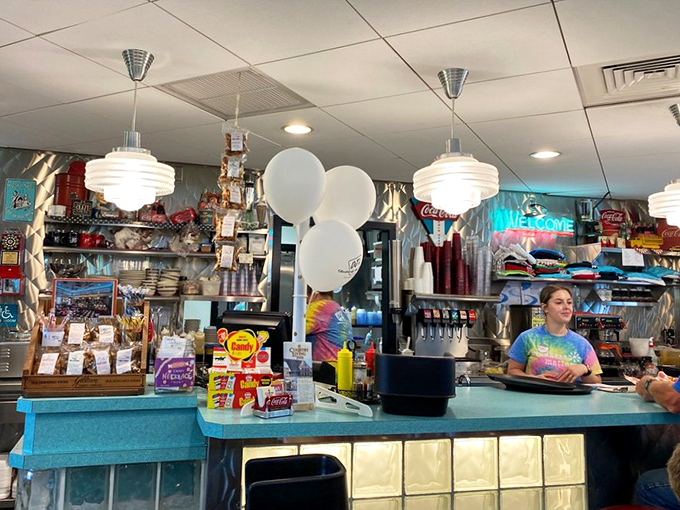 Behind every great diner is a staff that keeps the magic flowing, from milkshakes to memories, with balloons adding a touch of celebration.