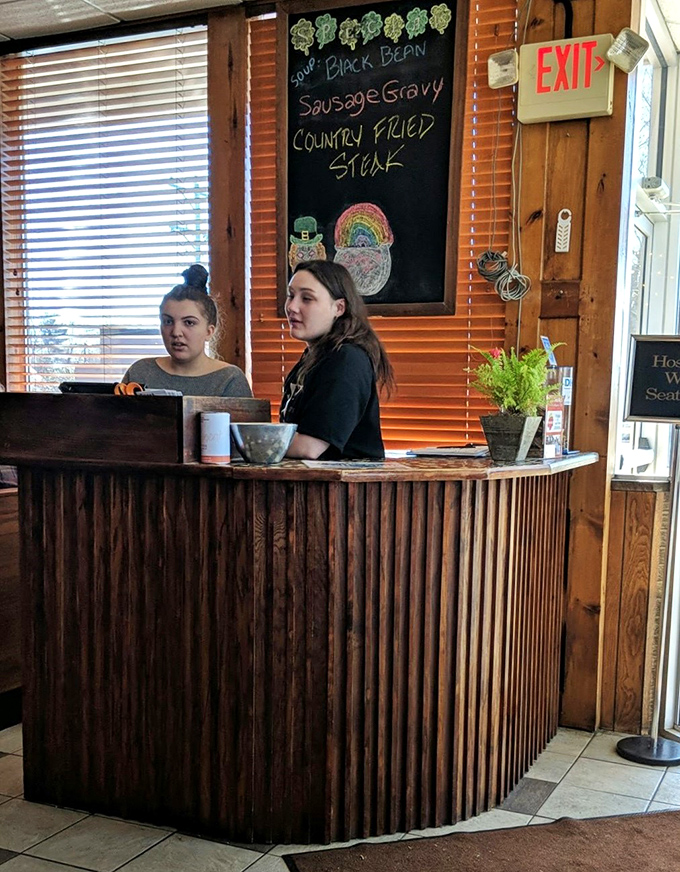 The host station where your journey to breakfast nirvana begins. That chalkboard menu hints at daily specials worth investigating.